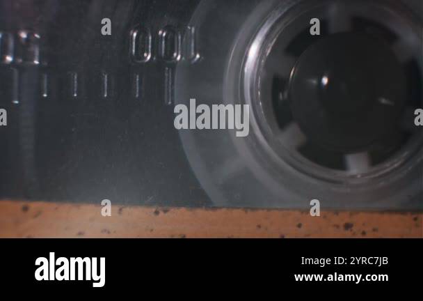 Extreme close-up of a vintage cassette tape, highlighting the texture ...
