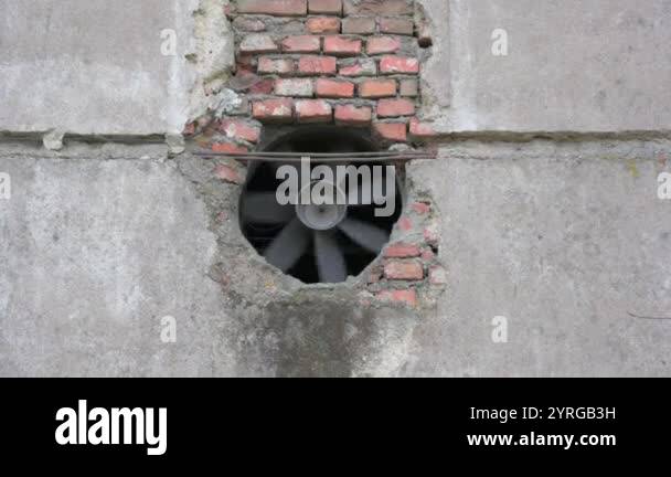 A rustic video showing the wall of an old barn with a spinning ...