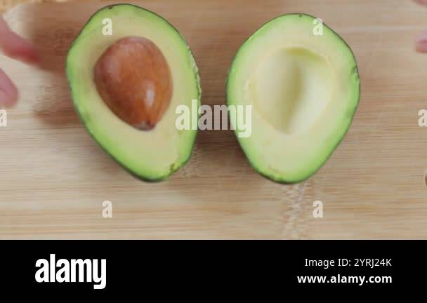Cut slice fresh green avocado Stock Videos & Footage - HD and 4K Video ...