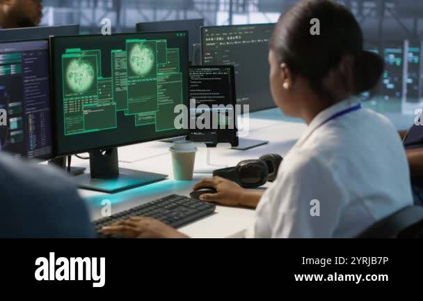 Team Of Engineers In Server Hub Trying To Protect Gear From Hacker Stealing Sensitive