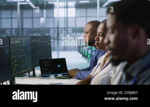 Focus on server hub employee developing disaster recovery plans ensuring minimal downtime ...