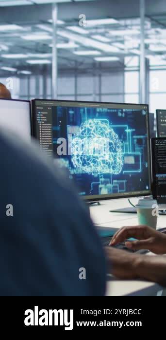 Vertical video African american worker in data center implements advanced AI driven predictive ...