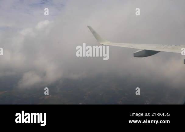 Flying in an airplane somewhere over the landscape of Costa Rica windy ...