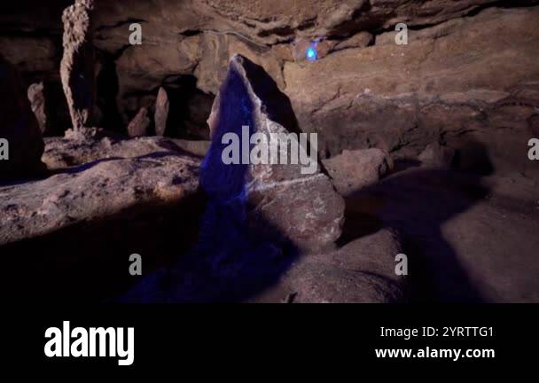 Close-up texture of a stone underground cave. Underground cave of water ...