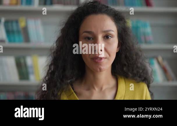 Latino Arabian Indian Hispanic woman silence sign holding finger mouth ...