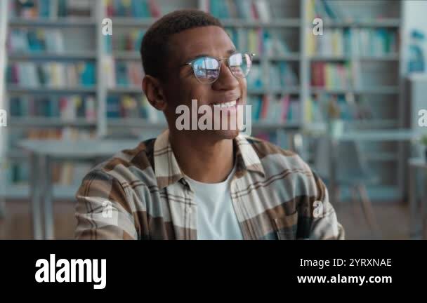 Happy African American man male guy student motivation smiling typing ...