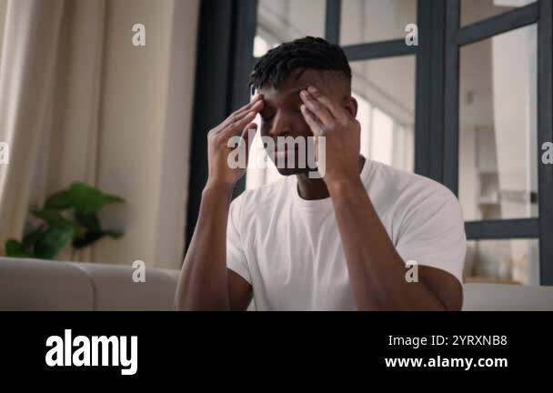 African American man ethnic male homeowner unwell feel bad suffer ...