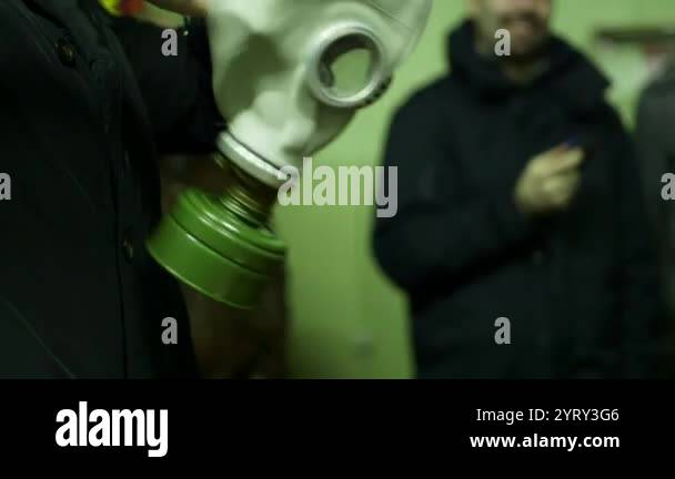 Man Puts Soviet-Era Gas Mask On His Face. Gas Mask is a Personal ...