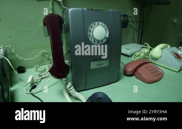 Old Soviet Payphone, Regular Dial Phone and Push Button Phone on Desk ...