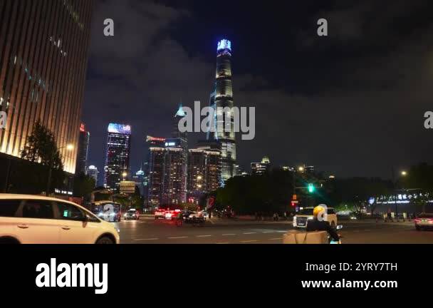 The vibrant night skyline of Shanghai showcases the illuminated ...