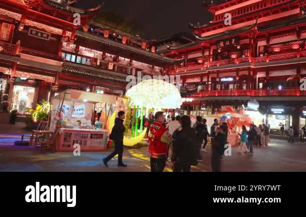 Yu Gardens in Shanghai is illuminated at night, highlighting ...