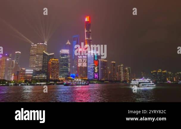 Shanghai's illuminated skyline with Shanghai Tower, World Financial ...