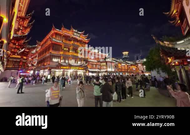 Yu Gardens in Shanghai is illuminated at night, showcasing traditional ...