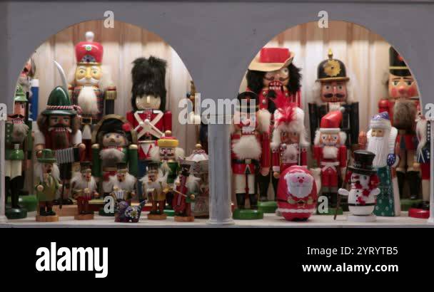 Hands open and show matryoshka Santa dolls. Festive display showcases a ...