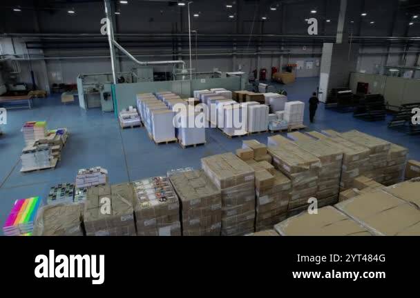 Hall of cardboard factory with finished products standing on floor ...