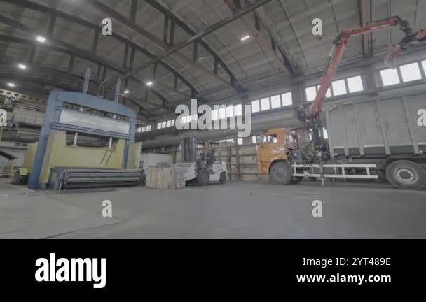 ALMATY, KAZAKHSTAN - SEPTEMBER 24 2024: Mechanized loader transports ...