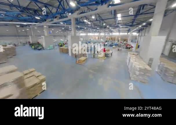 Hall of paper and cardboard factory containing industrial machines ...