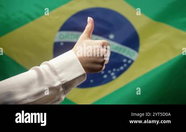 Woman Makes Hand Sign Like, Thumb Up Gesture on brazilian flag ...