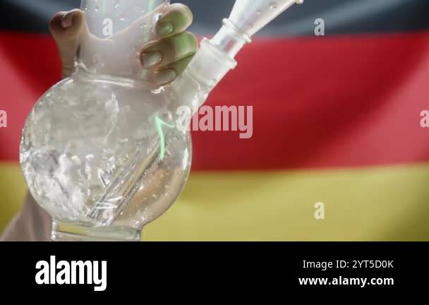 Woman Smoking Medical Marijuana, Glass Water Bong On deutschland Flag ...