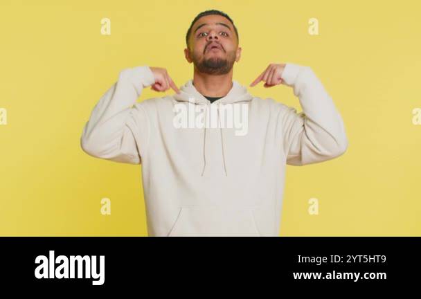 I am the best, choose me. Young excited Indian man winner feeling very ...