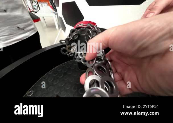 Magnetic effect.Science Experiments with Gravity. Hands throw metal ...