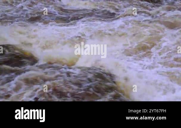 Water texture: Raging water flow with foam and rocks. Power and energy ...