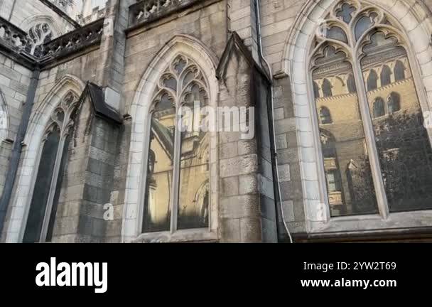 The stunning gothic architecture showcases intricate windows and ...