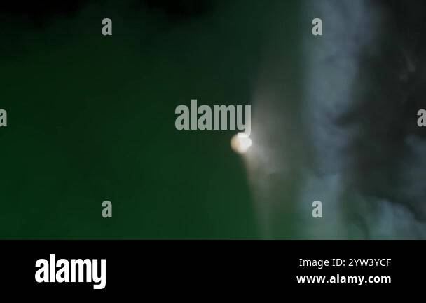 White beams of stage light in foggy studio. Bright white spotlights ...