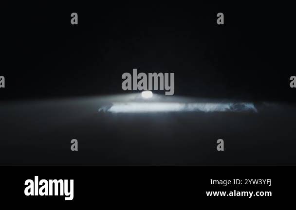 White beams of stage light in foggy studio. Bright white spotlights ...