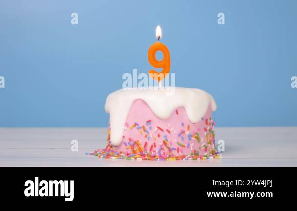 birthday cake with number nine candle to celebrate 9th birthday ...