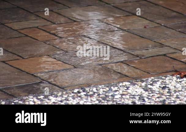 Rain falling on stone paver Stock Videos & Footage - HD and 4K Video ...