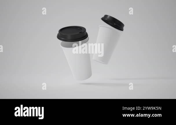Two Minimalist Black Blank Paper Coffee Cup floating above white ...