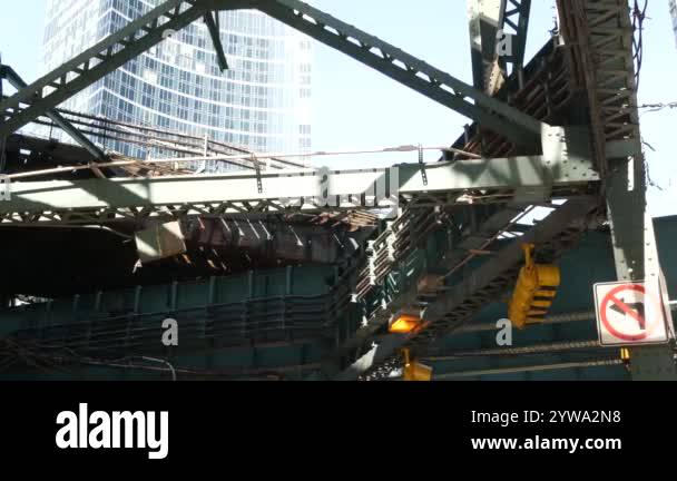 New York elevated subway, metropolitan bridge, metro track above street ...