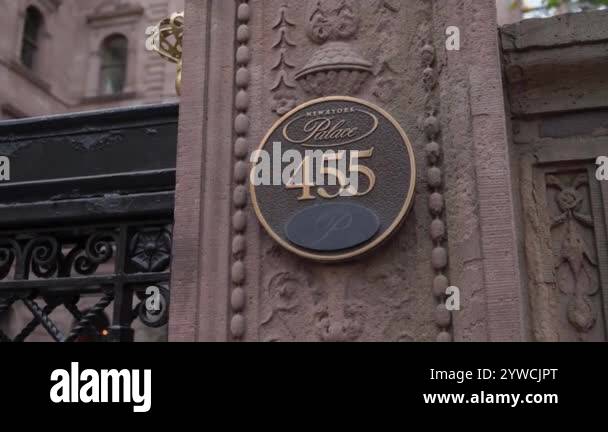 NEW YORK, USA - APRIL 4, 2024:A stylish and elegant address plaque ...