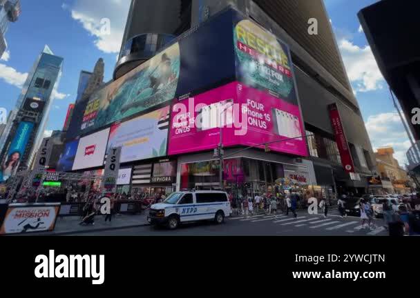 NEW YORK, USA - AUGUST 15, 2024: A vibrant and bustling view of Times ...