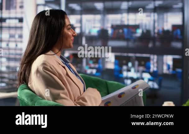 Female CEO determined to achieve success presents a growth idea to a ...