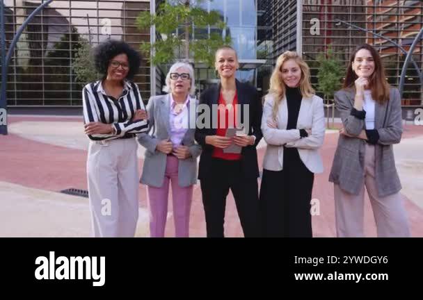 A group of five confident businesswomen of different ages and styles ...