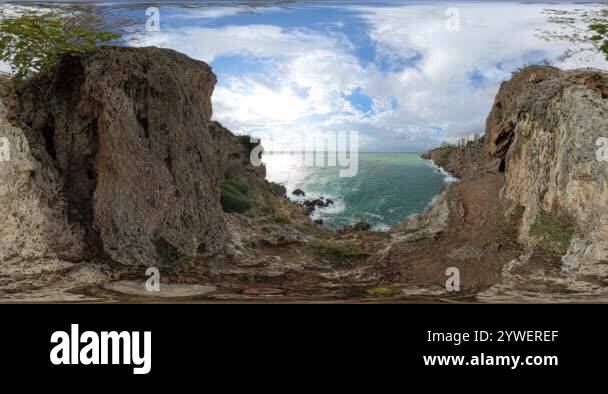 360 panorama of a cliffside view, with rugged rock formations framing ...