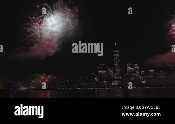 New York City Skyline Manhattan with Flashing Fireworks. New York Manhattan fireworks. New York ...