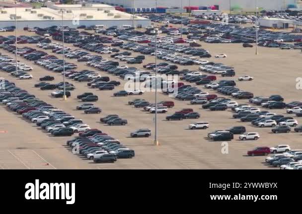 New cars parked for sale on automotive factory parking lot. Dealer ...