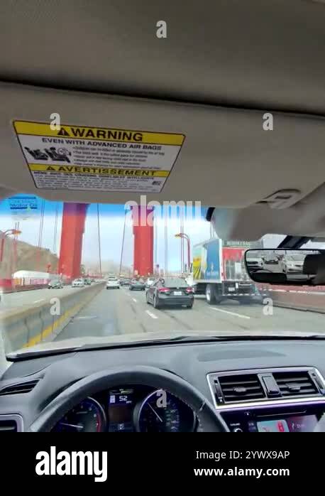 cars interior view of traffic crossing the Golden Gate Bridge ...