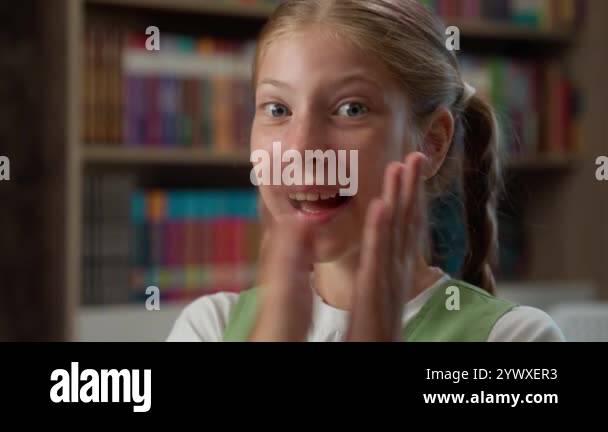 Close up happy jolly Caucasian little girl school child kid pupil ...