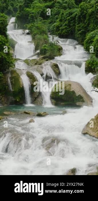 A multi-tiered waterfall. Aliwagwag falls. Cateel, Davao. Mindanao ...