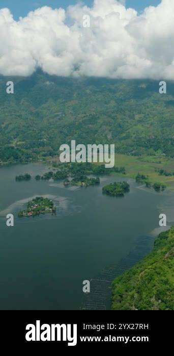 Beautiful view of Lake Sebu surrounded by forest and farmland. Blue sky ...