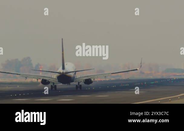 Rhine Air airplane with wings spread, landing gear touching down on ...