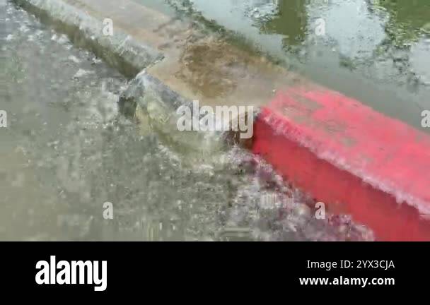 Water overflows from rivers, causing floods on the street Stock Video ...