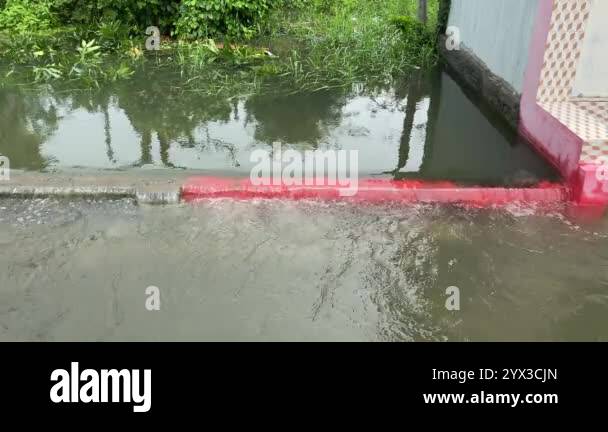 Water overflows from rivers, causing floods on the street Stock Video ...