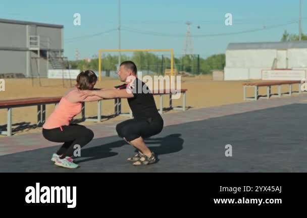 Girl squatting Stock Videos & Footage - HD and 4K Video Clips - Alamy
