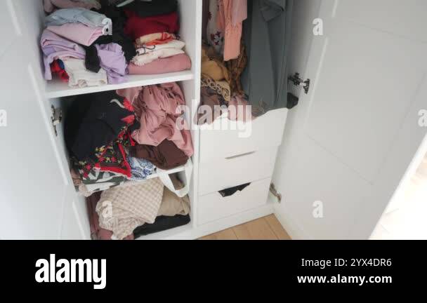 Overflowing wardrobe Stock Videos & Footage - HD and 4K Video Clips - Alamy