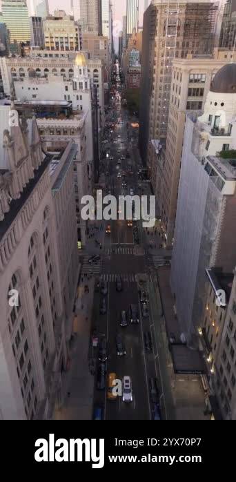Vertical screen panning up reveals Fifth Avenue in Midtown Manhattan ...